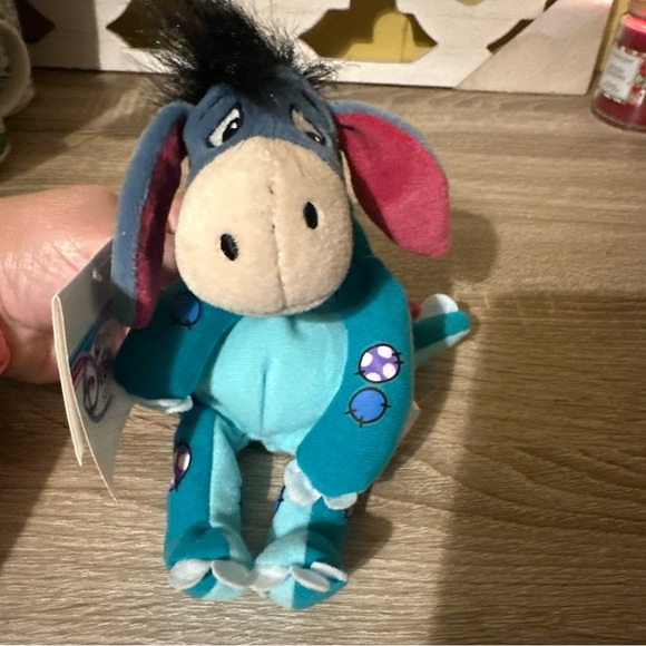 Disney | Toys | Disney Eeyore Dinosaur Plush With Blue And Purple ...